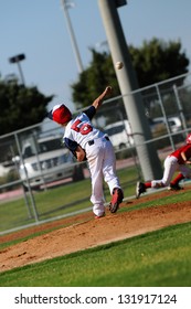 Baseball Pitcher Throwing First Base Stock Photo 131917124 | Shutterstock