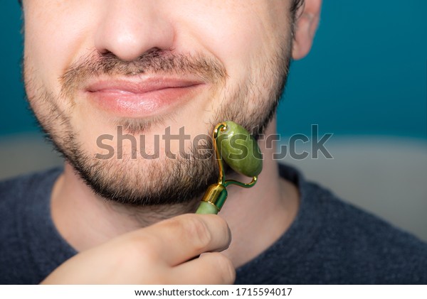 Bearded Man Using Jade Face Roller Stock Photo 1715594017 | Shutterstock
