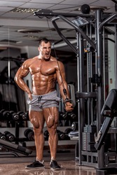 Muscular man bodybuilder putting on, a Sports & Recreation Photo by ...