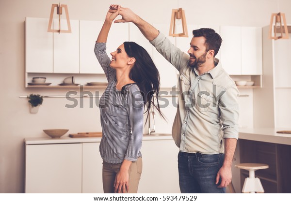 Beautiful Couple Smiling While Dancing Kitchen Stock Photo 593479529 ...