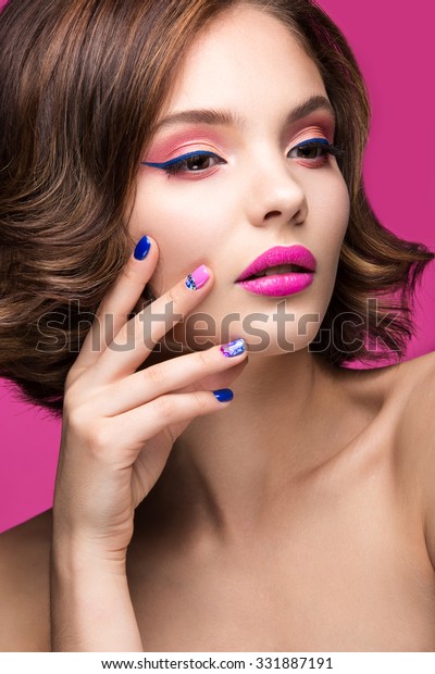 Beautiful Model Girl With Bright Makeup And Colored Nail Polish Beauty
