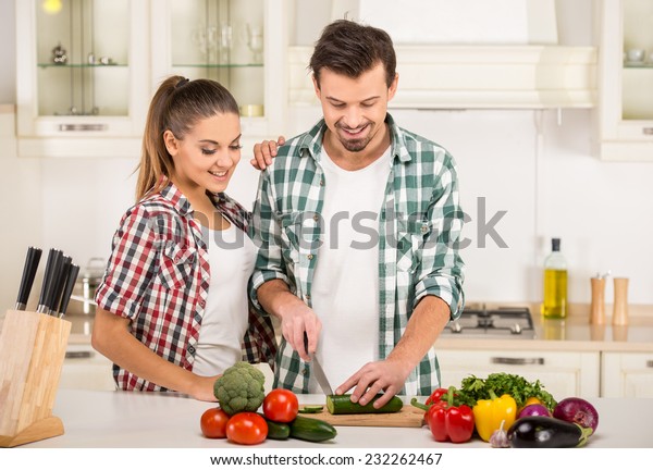 Beautiful Young Couple Kitchen While Cooking Stock Photo 232262467 ...