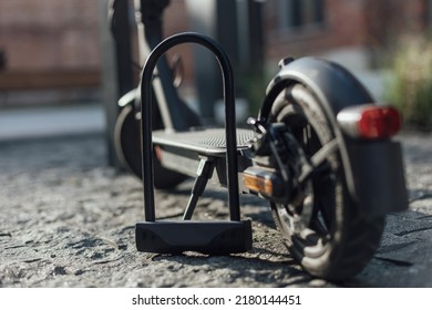 Bicycle U Lock Using Electric Scooter Stock Photo 2180144451 | Shutterstock