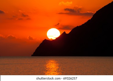Big Sun Setting Down Behind Mountains Stock Photo 69326257 | Shutterstock