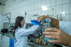 Pipette dropping green sample chemic featuring agriculture, analyzing ...