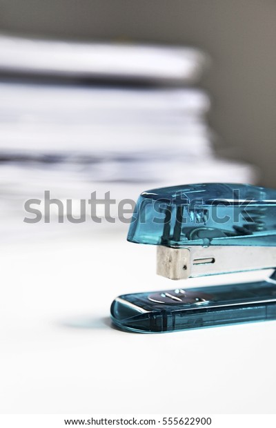 Blue Stapler On Table Stack Papers Stock Photo 555622900 | Shutterstock