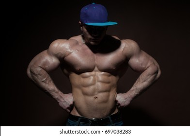 Bodybuilder Cap Posing Studio Stock Photo 697038283 | Shutterstock