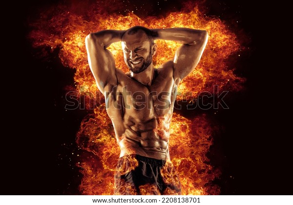 Bodybuilder Posing On Fire Flames Background Stock Photo 2208138701 ...