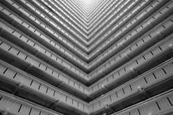Bottom view of stack building floors featuring building, sky, and light ...