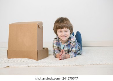7,232 Kid carrying a box Images, Stock Photos & Vectors | Shutterstock