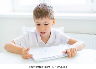 Boy Doing Homework Table Stock Photo (Edit Now) 1445906258