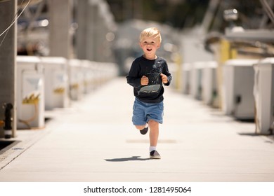 Boy Having Fun Running Down Boardwalk Stock Photo 1281495064 | Shutterstock