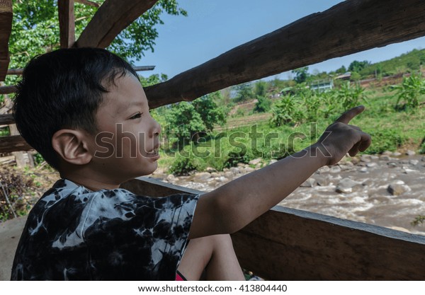 Boy Pointing Out Window Stock Photo 413804440 | Shutterstock