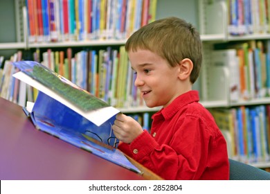 22,843 Boy Reading In Library Stock Photos, Images & Photography ...