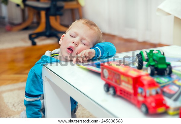Boy Sleeping On Table Stock Photo 245808568 | Shutterstock