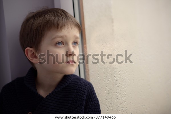 Boy Waiting By Window Stop Raining Stock Photo (Edit Now) 377149465