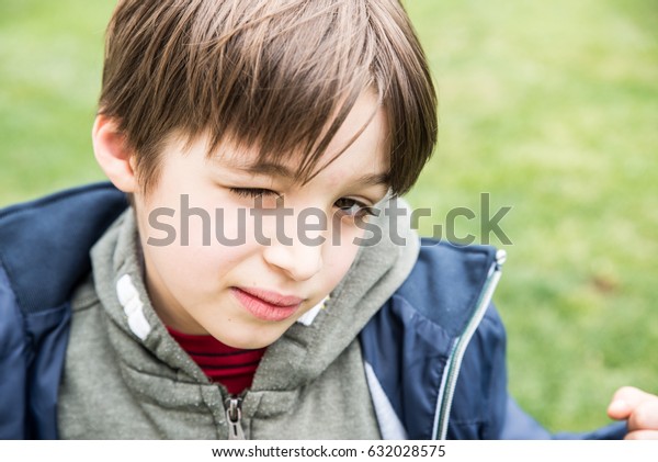 Boy Winking Stock Photo 632028575 | Shutterstock