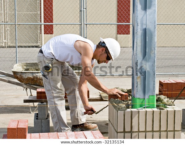 Bricklayer Laying Brick Stock Photo (Edit Now) 32135134