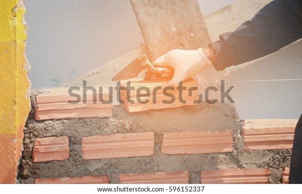 Bricklayer Worker Installing Brick Masonry On Stock Photo (Edit Now ...