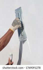 Builder Using Plastering Tool Finishing Wall Stock Photo 1769091278 ...