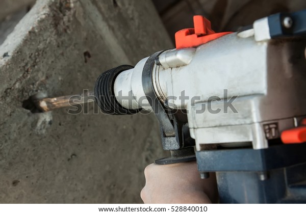 Builder Working Perforator Punch Wall Cuts Stock Photo (Edit Now) 528840010
