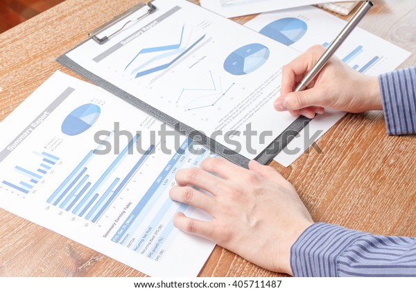 Business Man Analyzing Graph Chart Document Stock Photo 405711487 ...