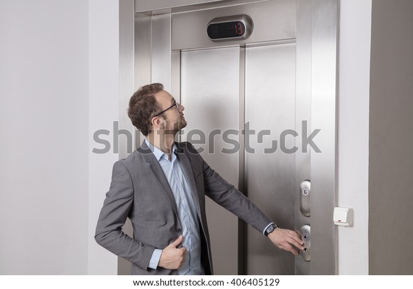 Businessman Calling Elevator Stock Photo 406405129 | Shutterstock