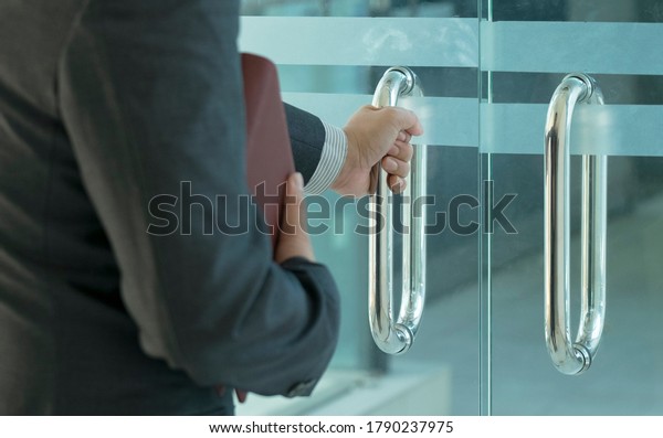 Businessman Entering Office By Opening Out Stock Photo (Edit Now ... Businessman Entering Office By Opening Out Stock Photo (Edit Now ...