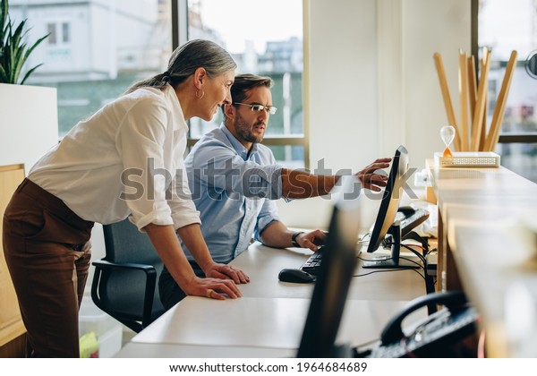 Businessman Pointing Computer Screen While Manager Stock Photo (Edit ...