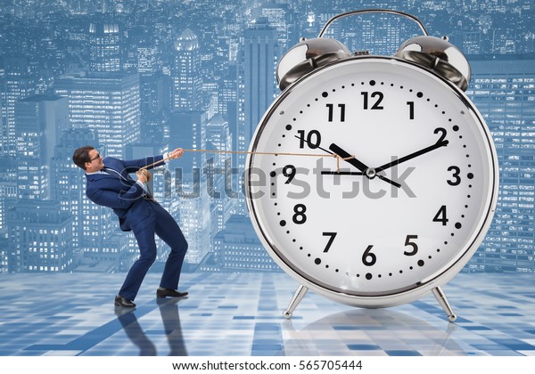 Businessman Pulling Clock Time Management Concept Stock Photo (Edit Now ...