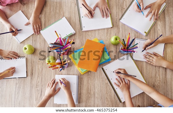 Busy Students Over One Table Stock Photo (Edit Now) 465375254