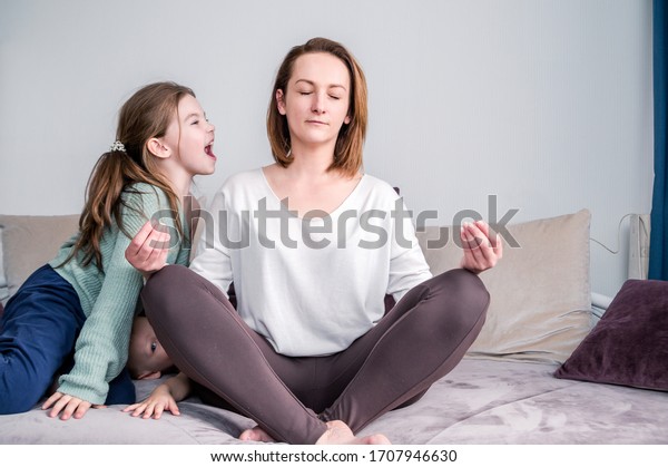 Calm Mindful Single Mom Doing Yoga Stock Photo 1707946630 | Shutterstock Calm Mindful Single Mom Doing Yoga Stock Photo 1707946630 | Shutterstock