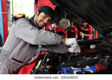 Car Mechanic Working On Car Engine Stock Photo 2201628231 | Shutterstock