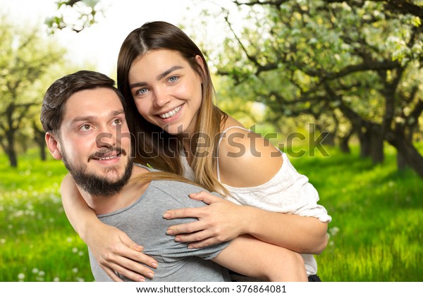 Cheerful Young Couple Standing Stock Photo 376864081 | Shutterstock Cheerful Young Couple Standing Stock Photo 376864081 | Shutterstock