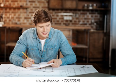 Cheerful Young Engineer Doing Calculations His Stock Photo 730773178 ...