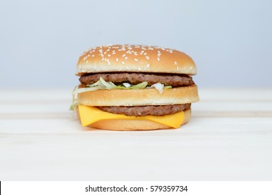 Cheeseburger On Table Stock Photo 579359734 | Shutterstock