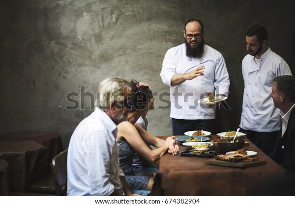 Chef Explaining Dish Customer Stock Photo (Edit Now) 674382904