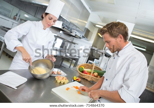 Chefs Prepping Stock Photo 714864370 | Shutterstock