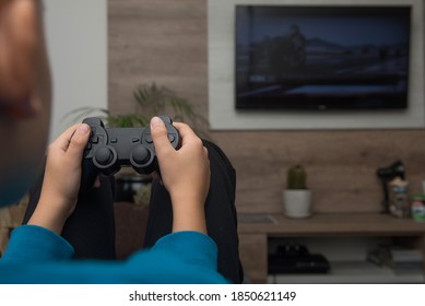 Child Holds Controller While Playing Console Stock Photo 1850621149 ...
