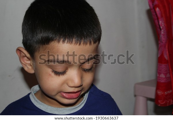 Child Looking Down Stock Photo 1930663637 | Shutterstock