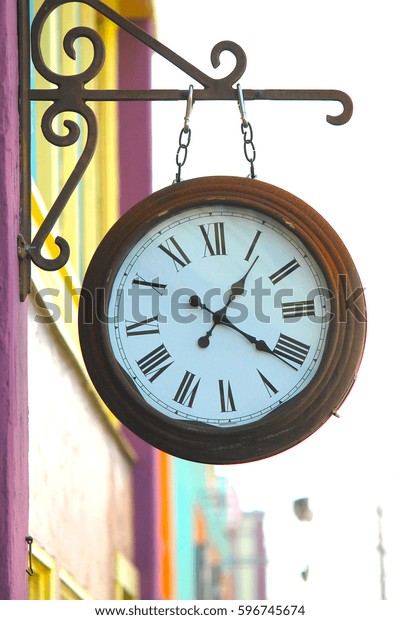 Clock Outside Store Front On Street Stock Photo (Edit Now) 596745674