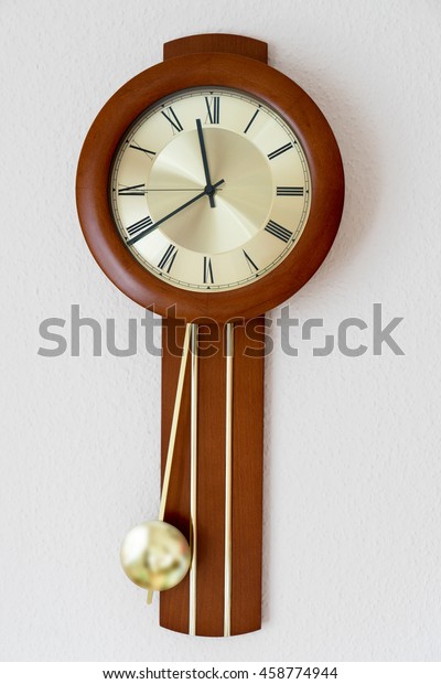 Clock Pendulum Hanging On Wall Stock Photo (Edit Now) 458774944