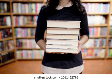 4,058 Carrying stack of books Images, Stock Photos & Vectors | Shutterstock