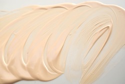 Close up texture of liquid featuring foundation, makeup, and texture, a ...
