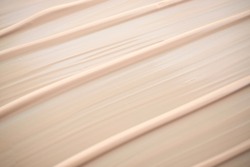 Close up texture of liquid featuring foundation, makeup, and texture, a ...