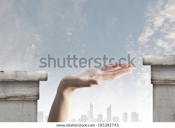 Close Human Hand Between Bridge Gap Stock Photo (Edit Now) 185382743