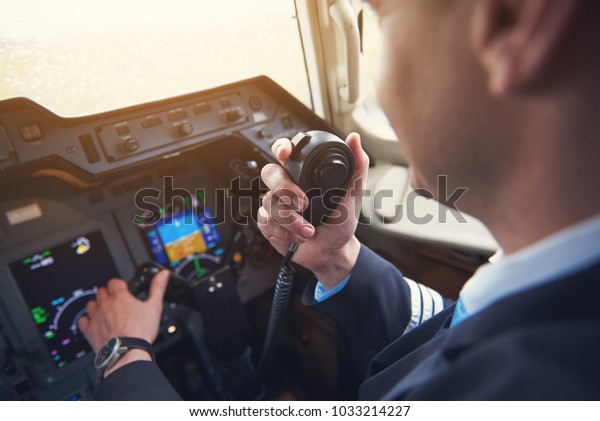 Close Pilot Hand Taking By Portable Stock Photo (Edit Now) 1033214227