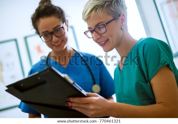 74,706 2 Nurses Images, Stock Photos & Vectors | Shutterstock