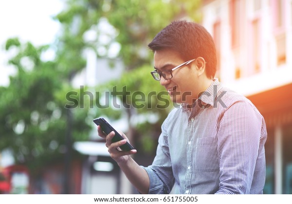 Close Young Asian Man Using Telephone Stock Photo 651755005 | Shutterstock