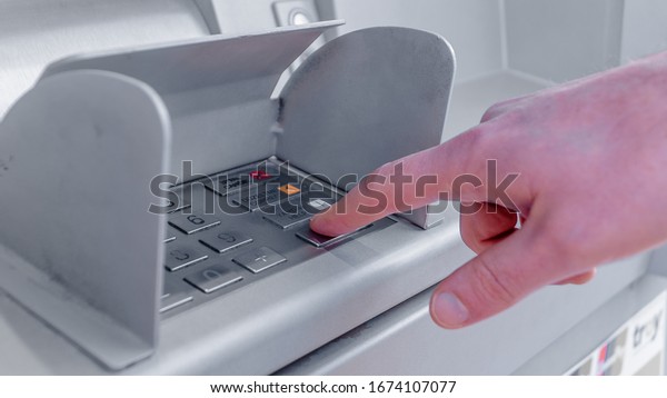 Closeup Hand Entering Pinpass Code On Stock Photo (Edit Now) 1674107077